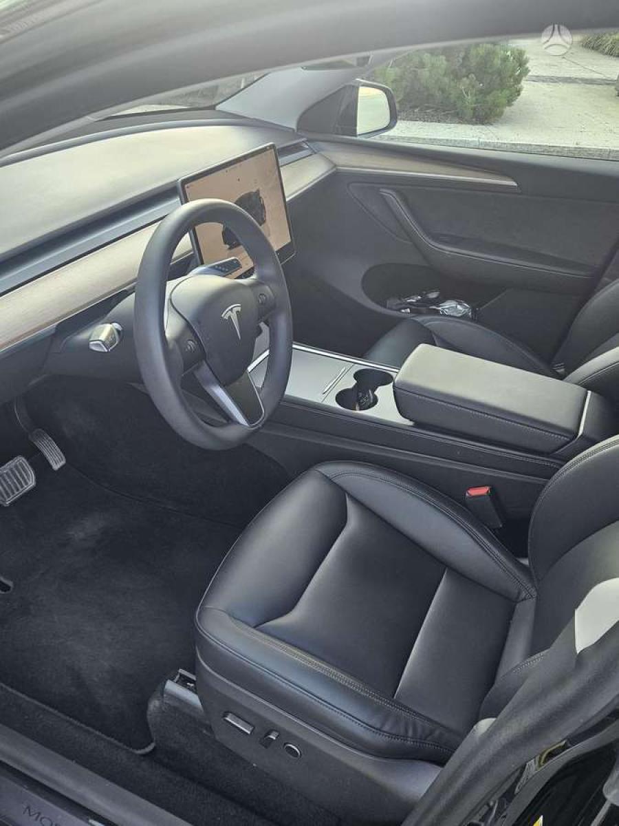 Melns Tesla Model Y 2023 Viļņa, ar dzinēja tilpumu 0.00 L un nobraukumu 60 tūkst. km par 25860 €, foto 14 vietnē AUTOMOTO.COM.LV