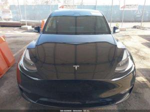 Melns Tesla Model Y 2023 Klaipėda, ar dzinēja tilpumu 0.00 L un nobraukumu 49 tūkst. km par 23100 €, foto 4 vietnē AUTOMOTO.COM.LV