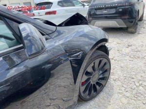 Black Tesla Model Y 2023 in Klaipeda, with an engine capacity of 0.00 L and mileage of 51 thousand km for 18876 €, photo 4 on AUTOMOTO.COM.LV