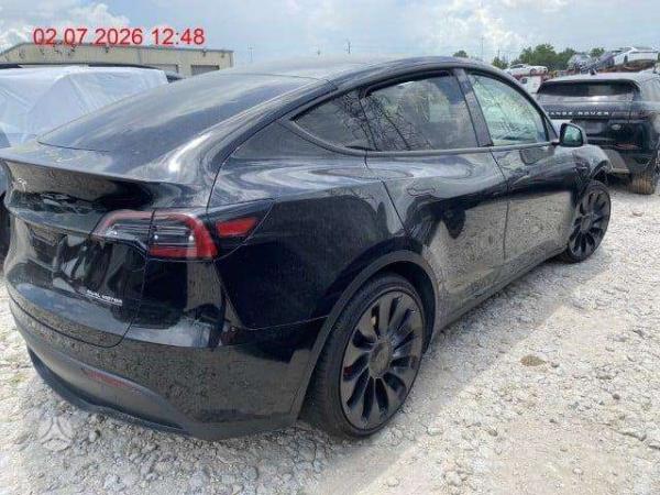 Melns Tesla Model Y 2023 Klaipėda, ar dzinēja tilpumu 0.00 L un nobraukumu 51 tūkst. km par 18876 €, foto 6 vietnē AUTOMOTO.COM.LV
