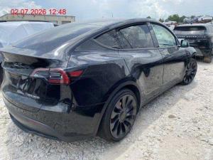 Black Tesla Model Y 2023 in Klaipeda, with an engine capacity of 0.00 L and mileage of 51 thousand km for 18876 €, photo 7 on AUTOMOTO.COM.LV