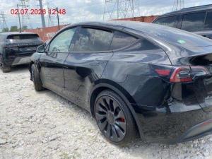 Black Tesla Model Y 2023 in Klaipeda, with an engine capacity of 0.00 L and mileage of 51 thousand km for 18876 €, photo 8 on AUTOMOTO.COM.LV
