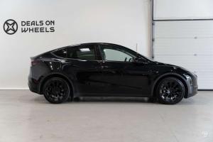 Melns Tesla Model Y 2023 Viļņa, ar dzinēja tilpumu 0.00 L un nobraukumu 128 tūkst. km par 32900 €, foto 4 vietnē AUTOMOTO.COM.LV