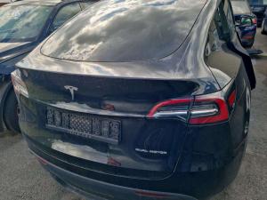 Black Tesla Model Y 2023 in Klaipeda, with an engine capacity of 0.00 L and mileage of 60 thousand km for 20900 €, photo 6 on AUTOMOTO.COM.LV