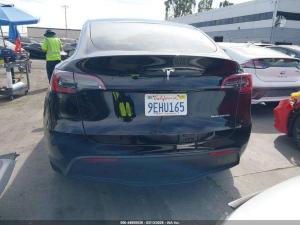 Black Tesla Model Y 2023 in Siauliai, with an engine capacity of 0.00 L and mileage of 78 thousand km for 19400 €, photo 5 on AUTOMOTO.COM.LV