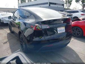 Black Tesla Model Y 2023 in Siauliai, with an engine capacity of 0.00 L and mileage of 78 thousand km for 19400 €, photo 6 on AUTOMOTO.COM.LV