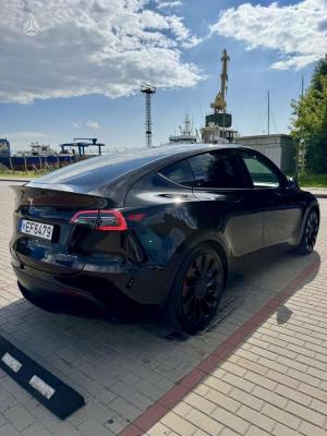 Melns Tesla Model Y 2023 Klaipėda, ar dzinēja tilpumu 0.00 L un nobraukumu 132 tūkst. km par 28700 €, foto  vietnē AUTOMOTO.COM.LV