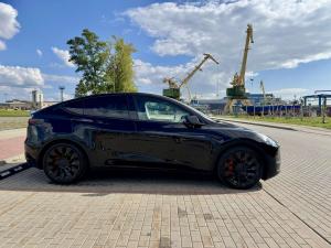 Black Tesla Model Y 2023 in Klaipeda, with an engine capacity of 0.00 L and mileage of 132 thousand km for 28700 €, photo 5 on AUTOMOTO.COM.LV