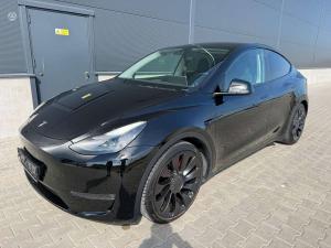 Black Tesla Model Y 2023 in Kaunas, with an engine capacity of 0.00 L and mileage of 52 thousand km for 33990 €, photo  on AUTOMOTO.COM.LV
