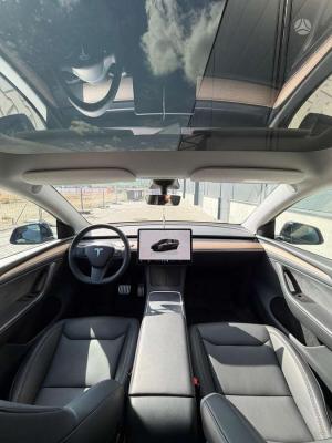 Black Tesla Model Y 2023 in Kaunas, with an engine capacity of 0.00 L and mileage of 52 thousand km for 33990 €, photo 9 on AUTOMOTO.COM.LV