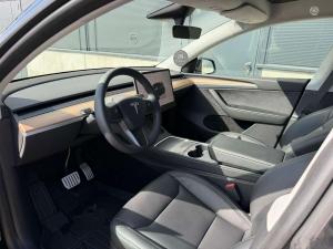 Black Tesla Model Y 2023 in Kaunas, with an engine capacity of 0.00 L and mileage of 52 thousand km for 33990 €, photo 11 on AUTOMOTO.COM.LV