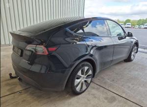 Melns Tesla Model Y 2023 Klaipėda, ar dzinēja tilpumu 0.00 L un nobraukumu 82 tūkst. km par 12900 €, foto  vietnē AUTOMOTO.COM.LV