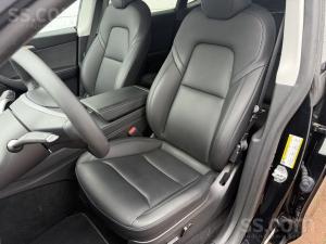 Black Tesla Model Y 2023 in Riga, with an engine capacity of 0.00 L and mileage of 66 thousand km for 36500 €, photo 6 on AUTOMOTO.COM.LV