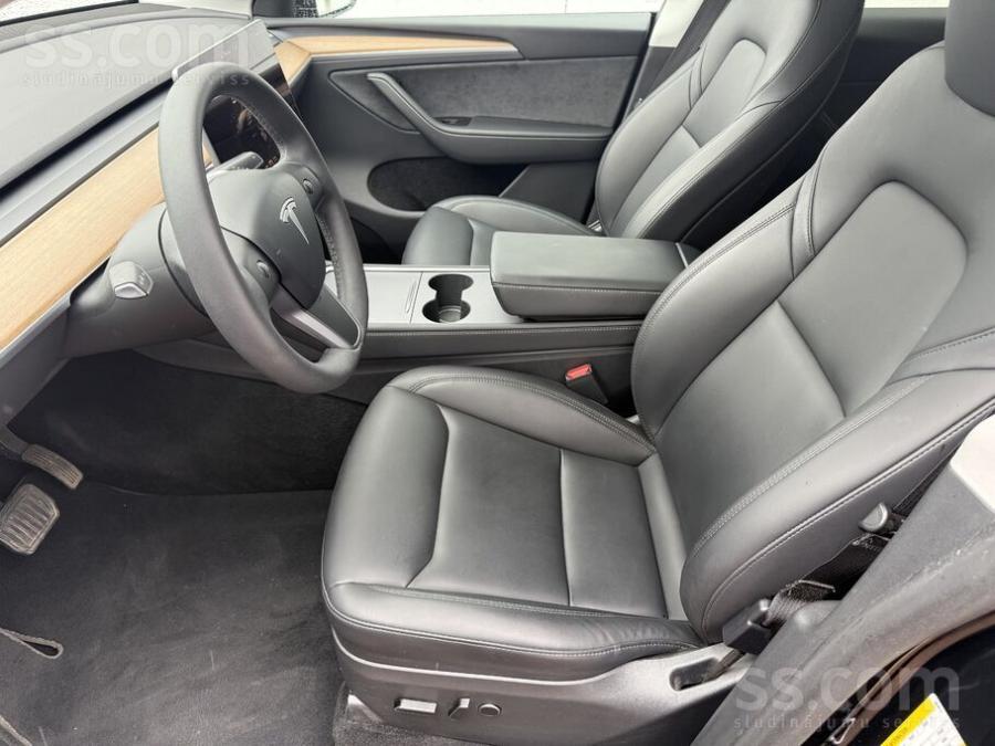 Black Tesla Model Y 2023 in Riga, with an engine capacity of 0.00 L and mileage of 66 thousand km for 36500 €, photo 8 on AUTOMOTO.COM.LV