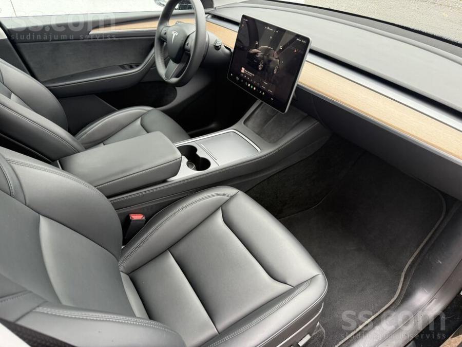 Black Tesla Model Y 2023 in Riga, with an engine capacity of 0.00 L and mileage of 66 thousand km for 36500 €, photo 12 on AUTOMOTO.COM.LV