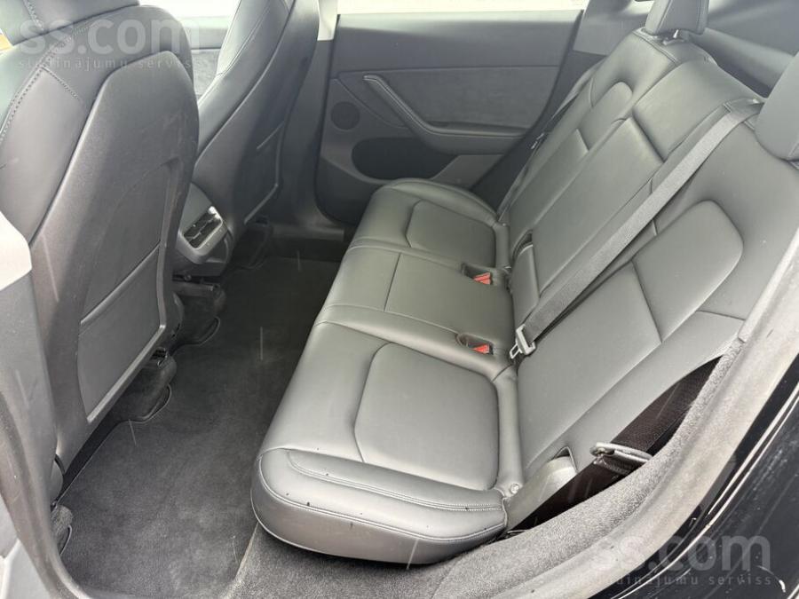 Black Tesla Model Y 2023 in Riga, with an engine capacity of 0.00 L and mileage of 66 thousand km for 36500 €, photo 15 on AUTOMOTO.COM.LV