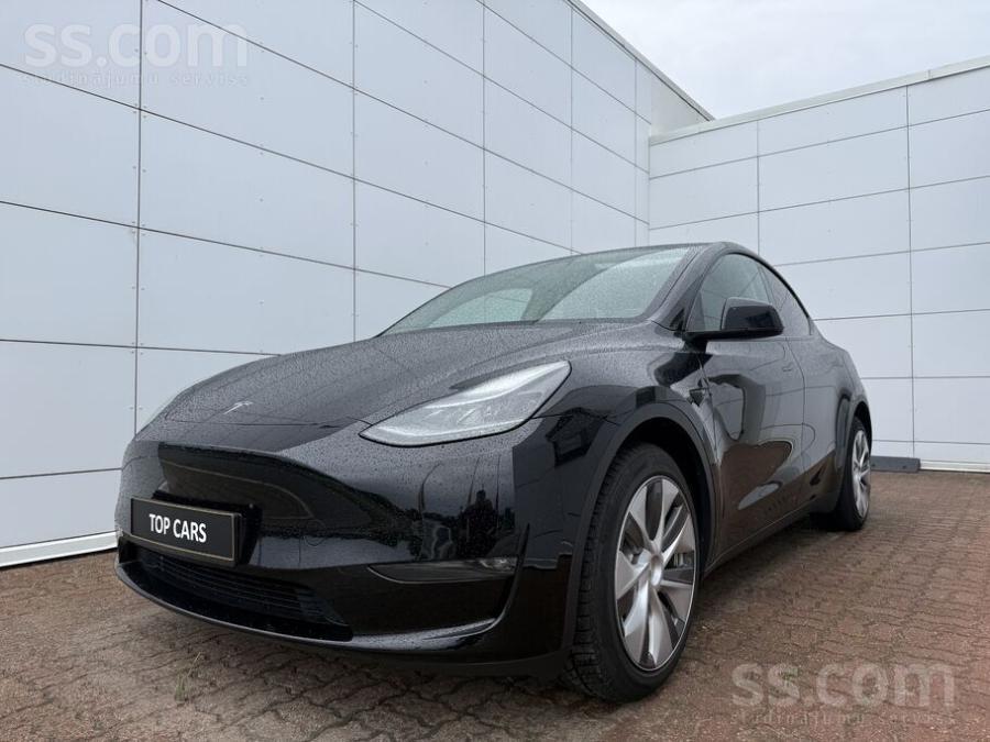 Black Tesla Model Y 2023 in Riga, with an engine capacity of 0.00 L and mileage of 54 thousand km for 38500 €, photo 1 on AUTOMOTO.COM.LV