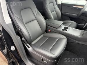 Black Tesla Model Y 2023 in Riga, with an engine capacity of 0.00 L and mileage of 54 thousand km for 38500 €, photo 11 on AUTOMOTO.COM.LV