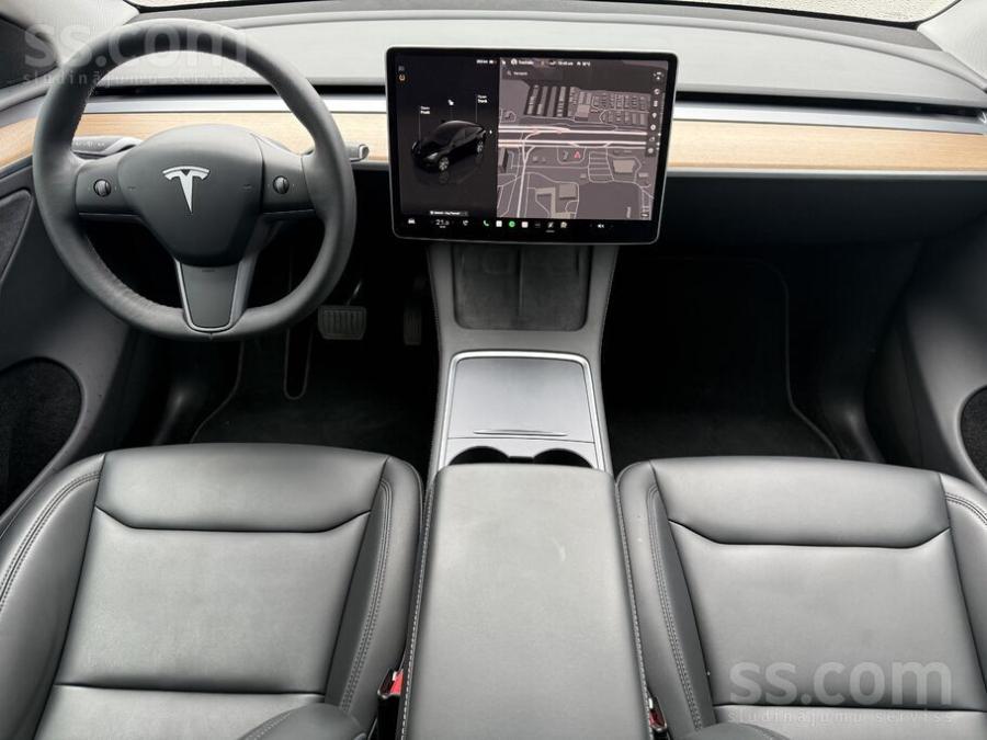 Black Tesla Model Y 2023 in Riga, with an engine capacity of 0.00 L and mileage of 54 thousand km for 38500 €, photo 12 on AUTOMOTO.COM.LV