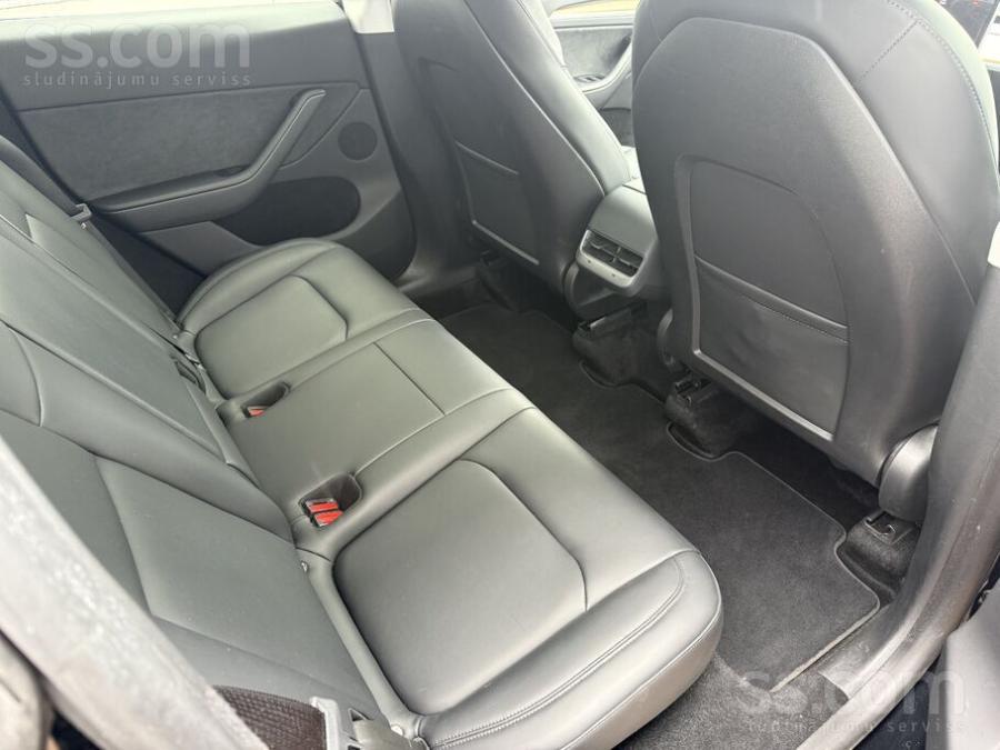 Black Tesla Model Y 2023 in Riga, with an engine capacity of 0.00 L and mileage of 54 thousand km for 38500 €, photo 16 on AUTOMOTO.COM.LV