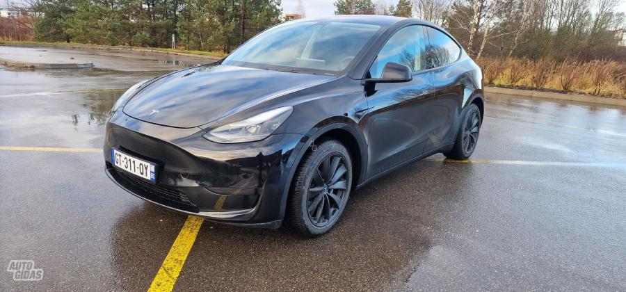 Black Tesla Model Y 2024 in Vilnius, with an engine capacity of 0.00 L and mileage of 25 thousand km for 28500 €, photo 1 on AUTOMOTO.COM.LV