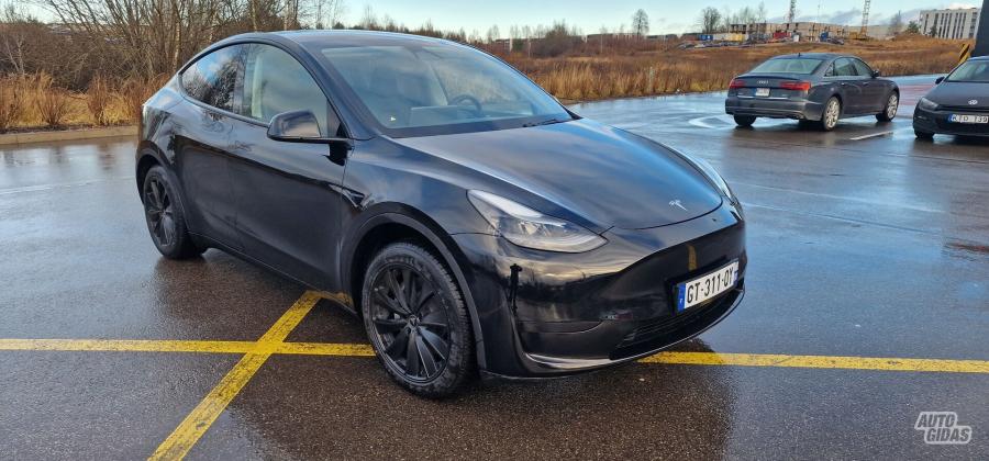 Black Tesla Model Y 2024 in Vilnius, with an engine capacity of 0.00 L and mileage of 25 thousand km for 28500 €, photo 2 on AUTOMOTO.COM.LV