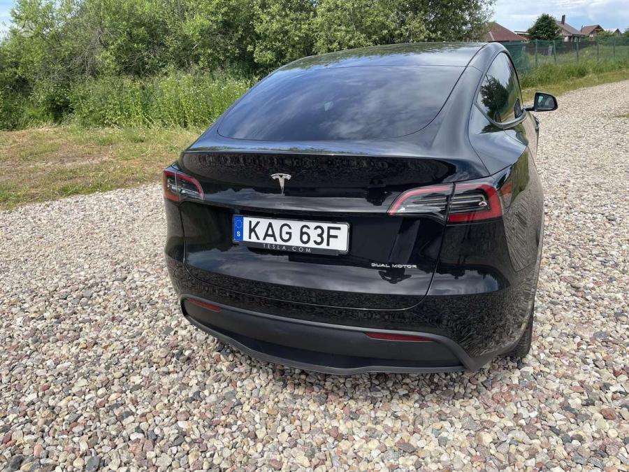 Black Tesla Model Y 2024 in Vilnius, with an engine capacity of 0.00 L and mileage of 195 thousand km for 25900 €, photo 5 on AUTOMOTO.COM.LV