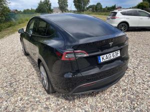 Black Tesla Model Y 2024 in Vilnius, with an engine capacity of 0.00 L and mileage of 195 thousand km for 25900 €, photo 7 on AUTOMOTO.COM.LV