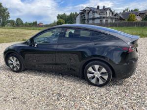 Black Tesla Model Y 2024 in Vilnius, with an engine capacity of 0.00 L and mileage of 195 thousand km for 25900 €, photo 9 on AUTOMOTO.COM.LV