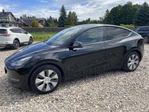 Black Tesla Model Y 2024 in Vilnius, with an engine capacity of 0.00 L and mileage of 195 thousand km for 25900 €, photo 11 on AUTOMOTO.COM.LV