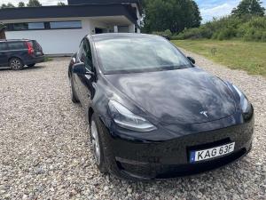 Black Tesla Model Y 2024 in Vilnius, with an engine capacity of 0.00 L and mileage of 195 thousand km for 25900 €, photo 15 on AUTOMOTO.COM.LV