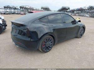 Black Tesla Model Y 2024 in Klaipeda, with an engine capacity of 0.00 L and mileage of 80 thousand km for 21100 €, photo 5 on AUTOMOTO.COM.LV