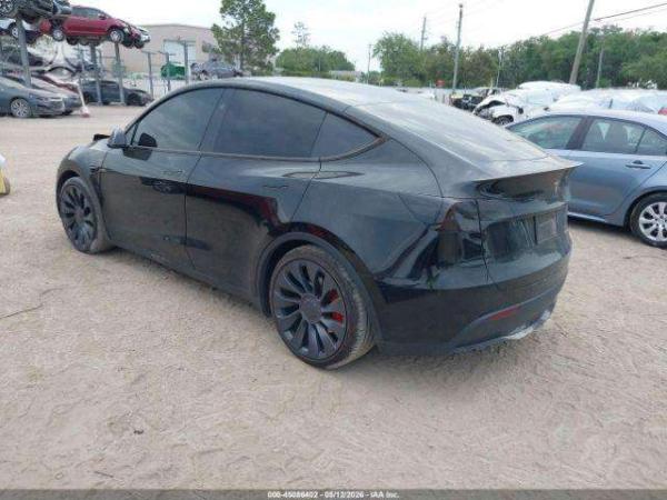 Black Tesla Model Y 2024 in Klaipeda, with an engine capacity of 0.00 L and mileage of 80 thousand km for 21100 €, photo 5 on AUTOMOTO.COM.LV