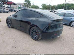 Black Tesla Model Y 2024 in Klaipeda, with an engine capacity of 0.00 L and mileage of 80 thousand km for 21100 €, photo 6 on AUTOMOTO.COM.LV