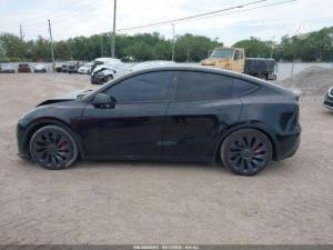 Black Tesla Model Y 2024 in Klaipeda, with an engine capacity of 0.00 L and mileage of 80 thousand km for 21100 €, photo 7 on AUTOMOTO.COM.LV