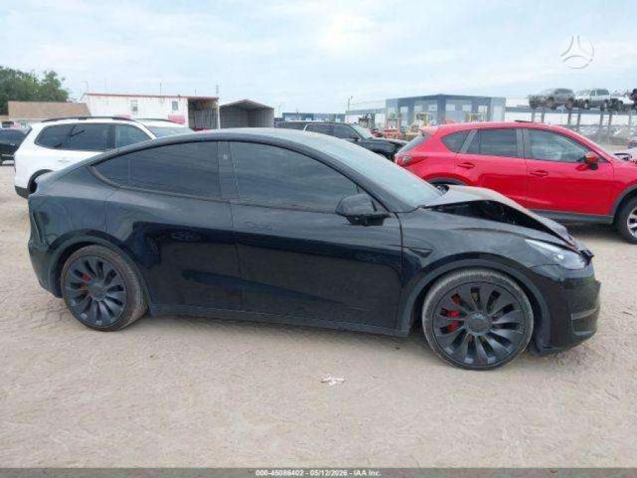 Black Tesla Model Y 2024 in Klaipeda, with an engine capacity of 0.00 L and mileage of 80 thousand km for 21100 €, photo 8 on AUTOMOTO.COM.LV