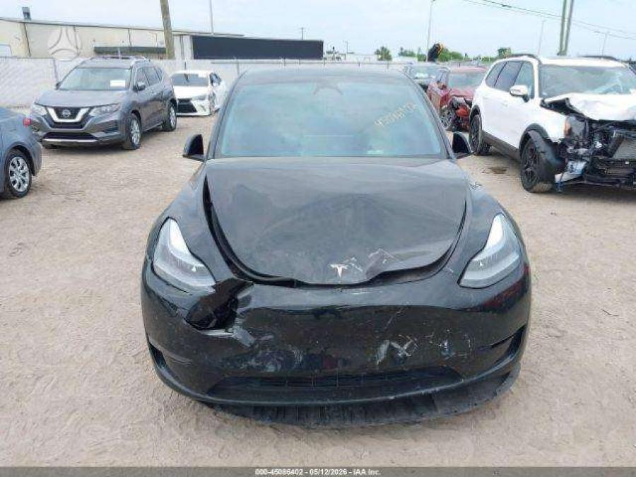 Black Tesla Model Y 2024 in Klaipeda, with an engine capacity of 0.00 L and mileage of 80 thousand km for 21100 €, photo 10 on AUTOMOTO.COM.LV