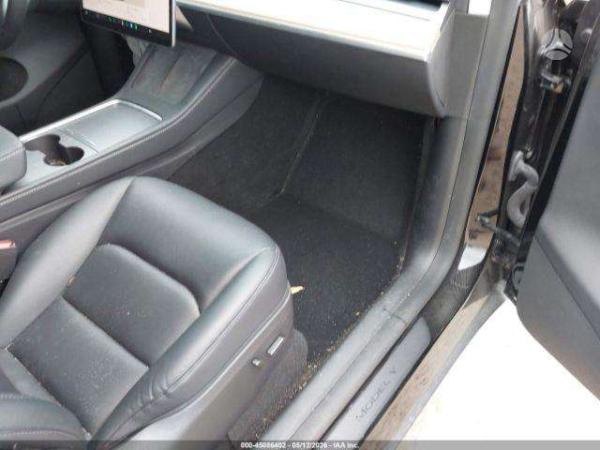 Black Tesla Model Y 2024 in Klaipeda, with an engine capacity of 0.00 L and mileage of 80 thousand km for 21100 €, photo 10 on AUTOMOTO.COM.LV