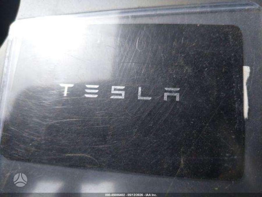 Black Tesla Model Y 2024 in Klaipeda, with an engine capacity of 0.00 L and mileage of 80 thousand km for 21100 €, photo 14 on AUTOMOTO.COM.LV