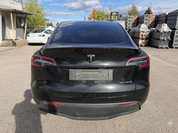 Black Tesla Model Y 2024 in Kaunas, with an engine capacity of 0.00 L and mileage of 50 thousand km for 23990 €, photo 6 on AUTOMOTO.COM.LV