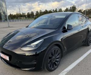 Black Tesla Model Y 2024 in Siauliai, with an engine capacity of 0.00 L and mileage of 43 thousand km for 33900 €, photo  on AUTOMOTO.COM.LV