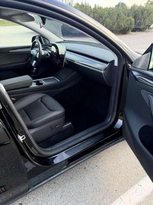 Melns Tesla Model Y 2024 Šauļi, ar dzinēja tilpumu 0.00 L un nobraukumu 43 tūkst. km par 33900 €, foto 10 vietnē AUTOMOTO.COM.LV