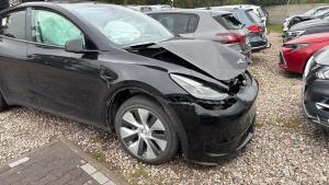Black Tesla Model Y 2024 in Prienai, with an engine capacity of 0.00 L and mileage of 115 thousand km for 17209 €, photo  on AUTOMOTO.COM.LV