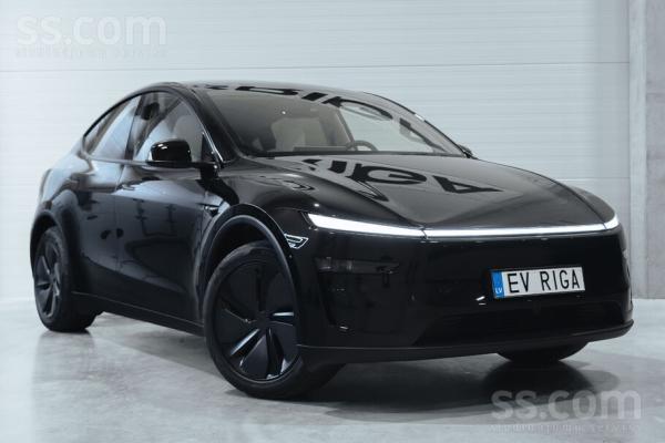 Black Tesla Model Y 2025 in Riga, with an engine capacity of 0.00 L and mileage of 115 thousand km for 60490 €, photo 1 on AUTOMOTO.COM.LV