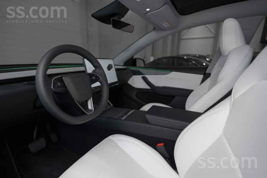 Melns Tesla Model Y 2025 Rīga, ar dzinēja tilpumu 0.00 L un nobraukumu 115 tūkst. km par 60490 €, foto 10 vietnē AUTOMOTO.COM.LV