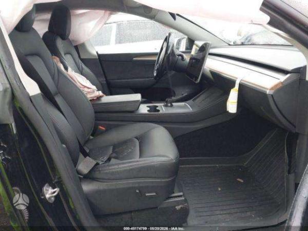 Black Tesla Model Y 2025 in Vilnius, with an engine capacity of 0.00 L and mileage of 108 thousand km for 17900 €, photo 10 on AUTOMOTO.COM.LV