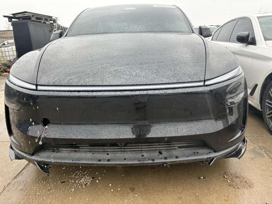 Black Tesla Model Y 2026 in Vilnius, with an engine capacity of 0.00 L and mileage of 2 thousand km for 29900 €, photo 15 on AUTOMOTO.COM.LV