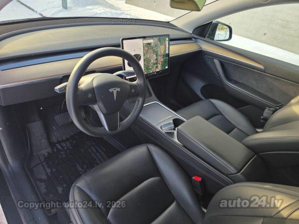 Black Tesla Model Y 2021 in Viljandi, with an engine capacity of 0.00 L and mileage of 87 thousand km for 32999 €, photo 11 on AUTOMOTO.COM.LV