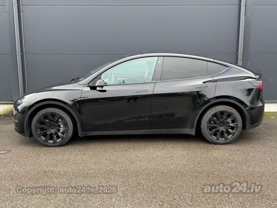 Black Tesla Model Y 2021 in Tallinn, with an engine capacity of 0.00 L and mileage of 98 thousand km for 28900 €, photo 5 on AUTOMOTO.COM.LV