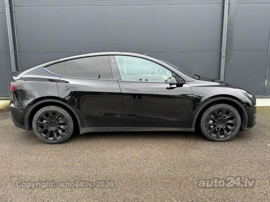 Black Tesla Model Y 2021 in Tallinn, with an engine capacity of 0.00 L and mileage of 98 thousand km for 28900 €, photo 6 on AUTOMOTO.COM.LV
